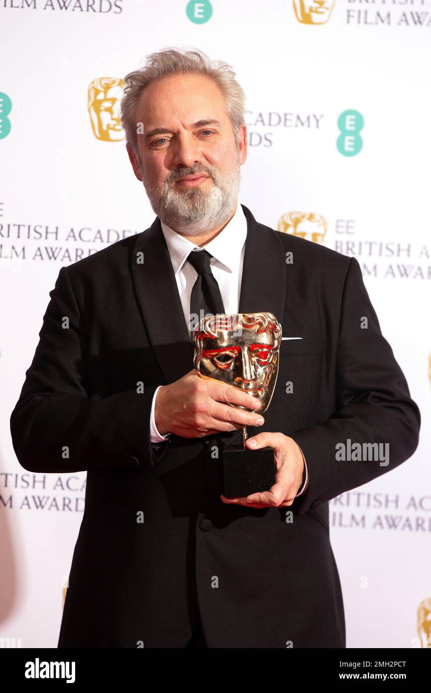 Director Sam Mendes poses with the Best Director award for 1917 ...