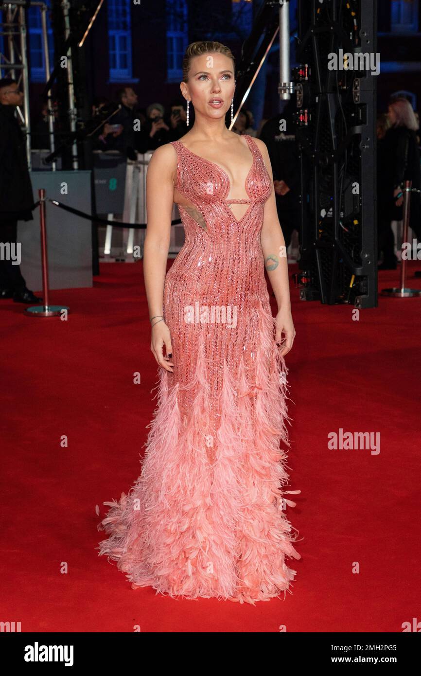 Scarlett Johansson poses for photographers upon arrival at the Bafta ...
