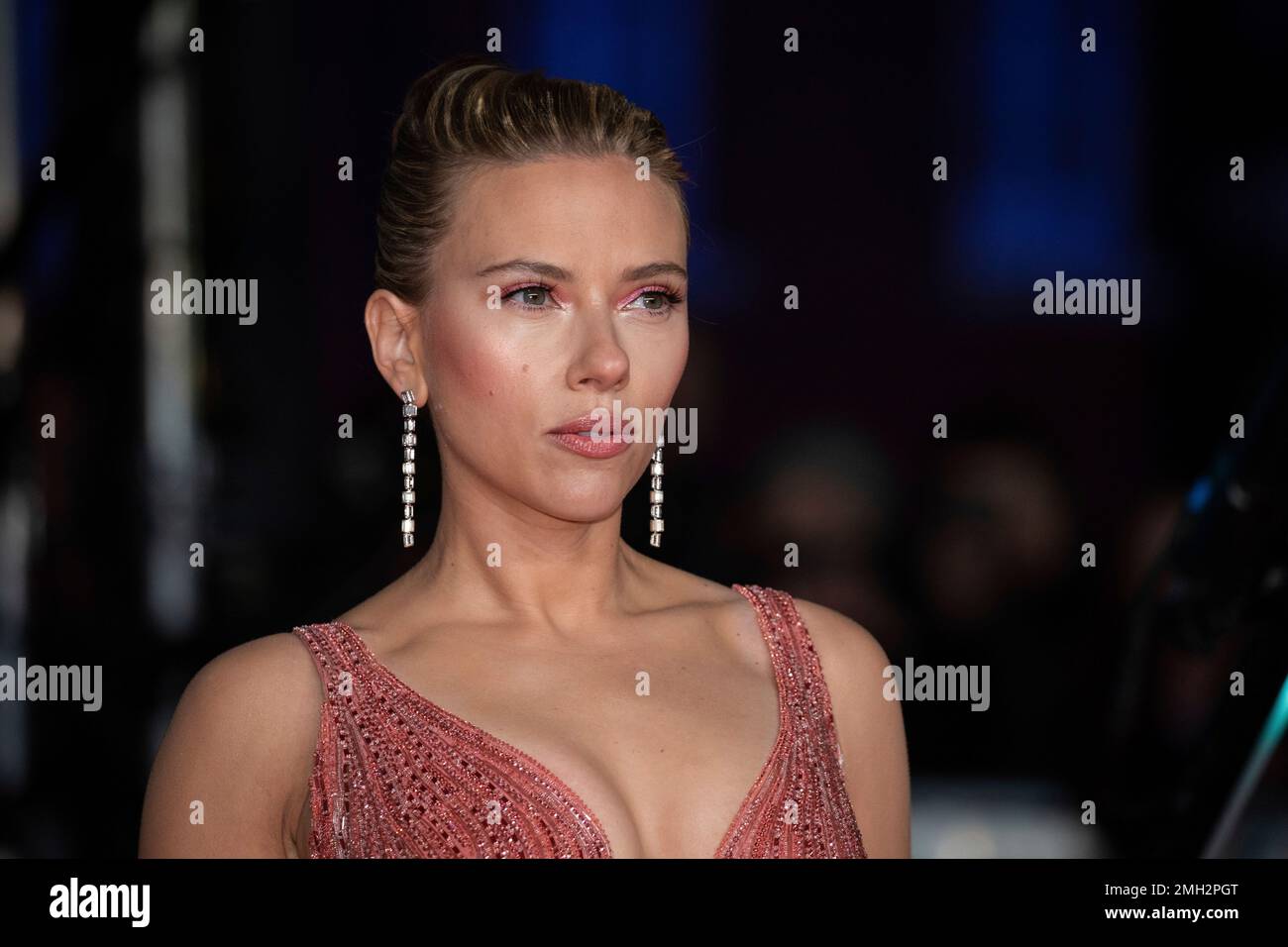 Scarlett Johansson poses for photographers upon arrival at the Bafta ...