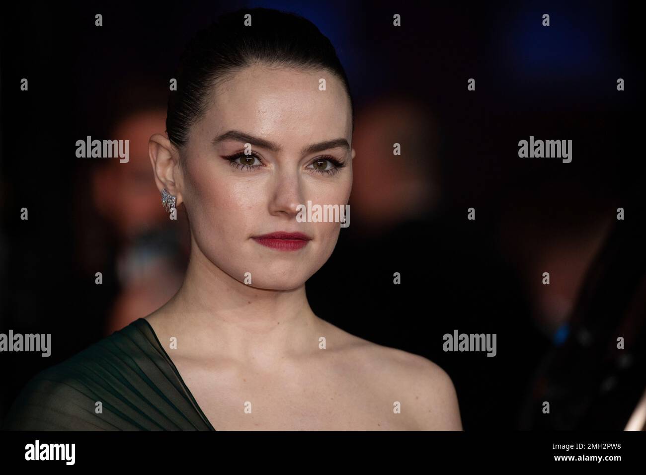 Daisy Ridley poses for photographers upon arrival at the Bafta Film ...