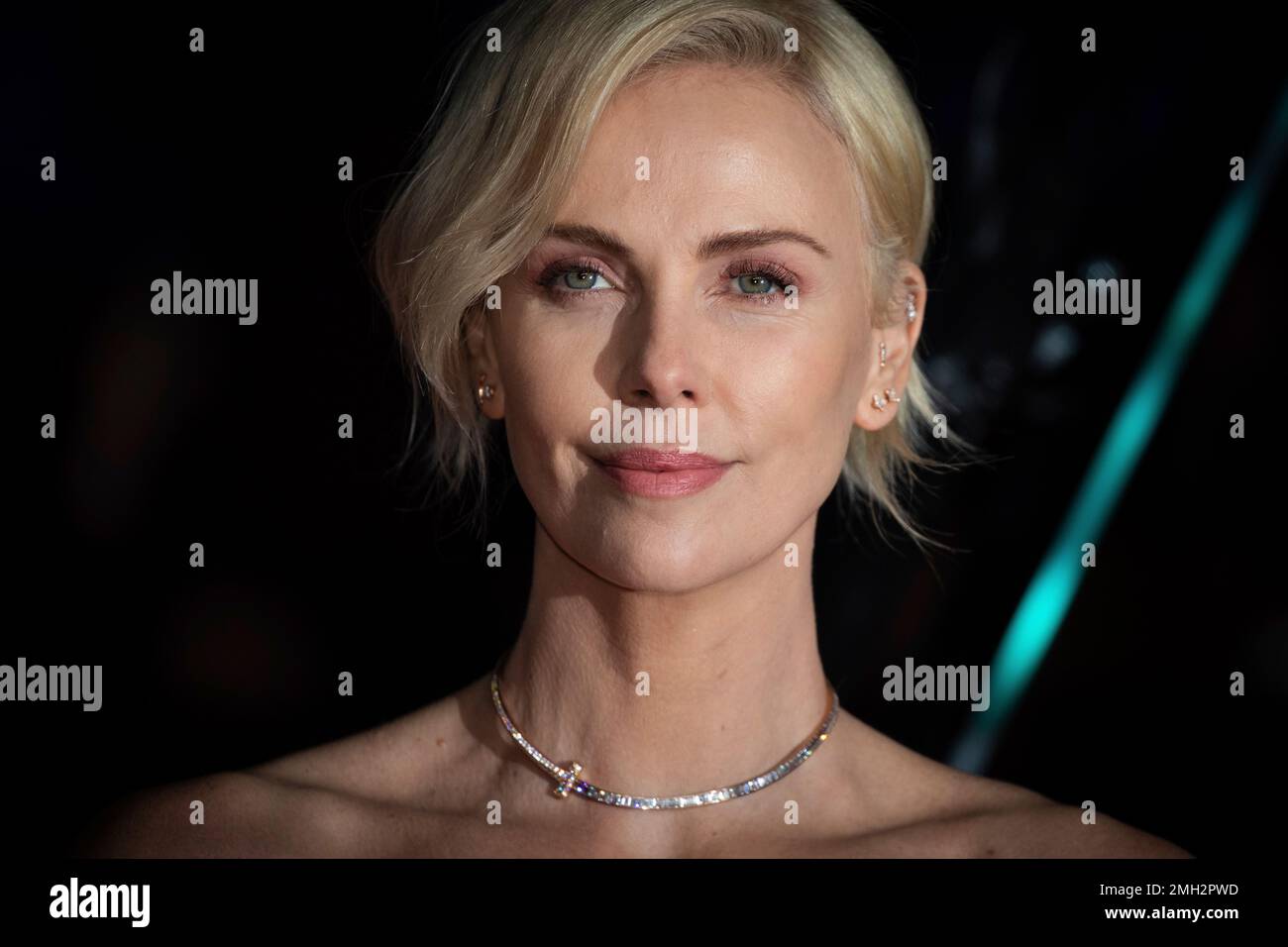 Actress Charlize Theron poses for photographers upon arrival at the ...
