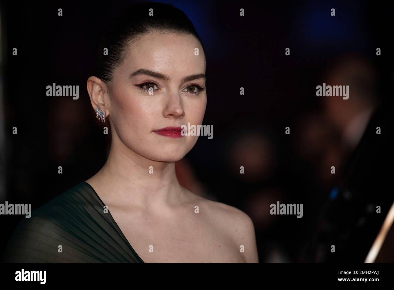 Daisy Ridley poses for photographers upon arrival at the Bafta Film ...