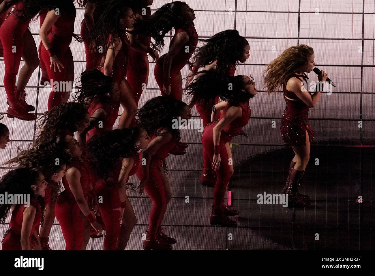 Singer Shakira, right, performs, during the halftime show of the NFL ...