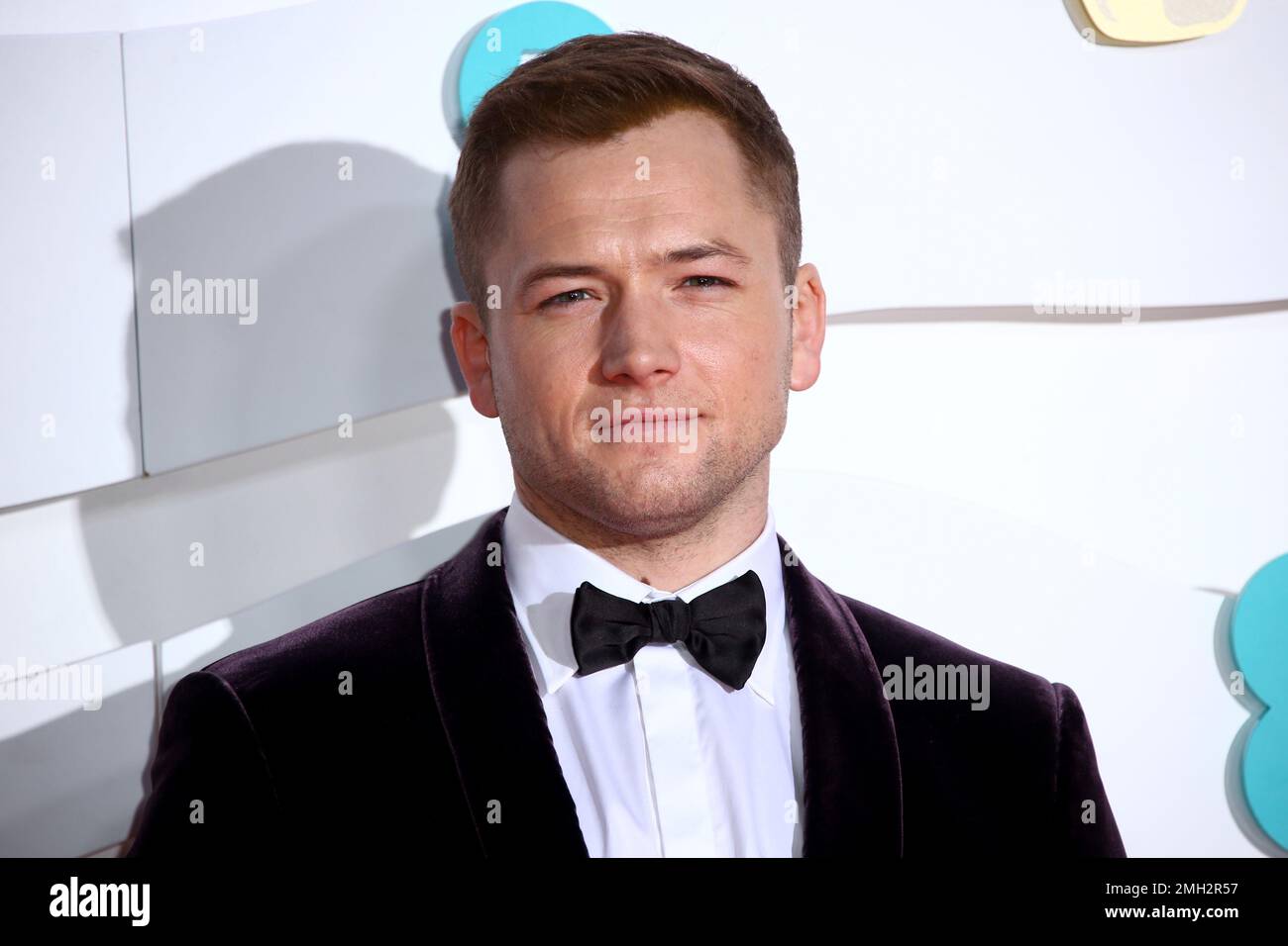 Actor Taron Egerton poses for photographers upon arrival at the Bafta ...