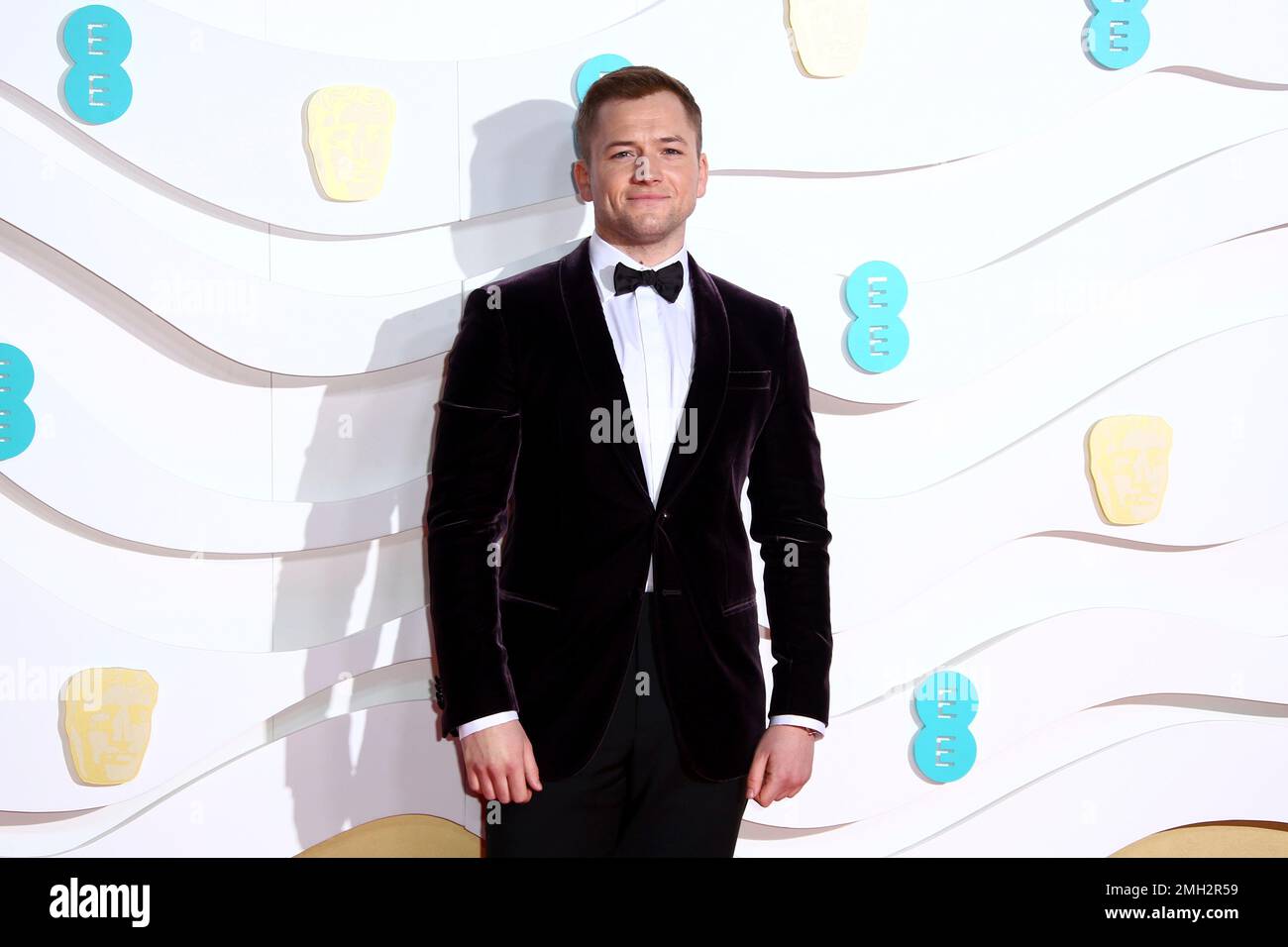 Actor Taron Egerton poses for photographers upon arrival at the Bafta ...