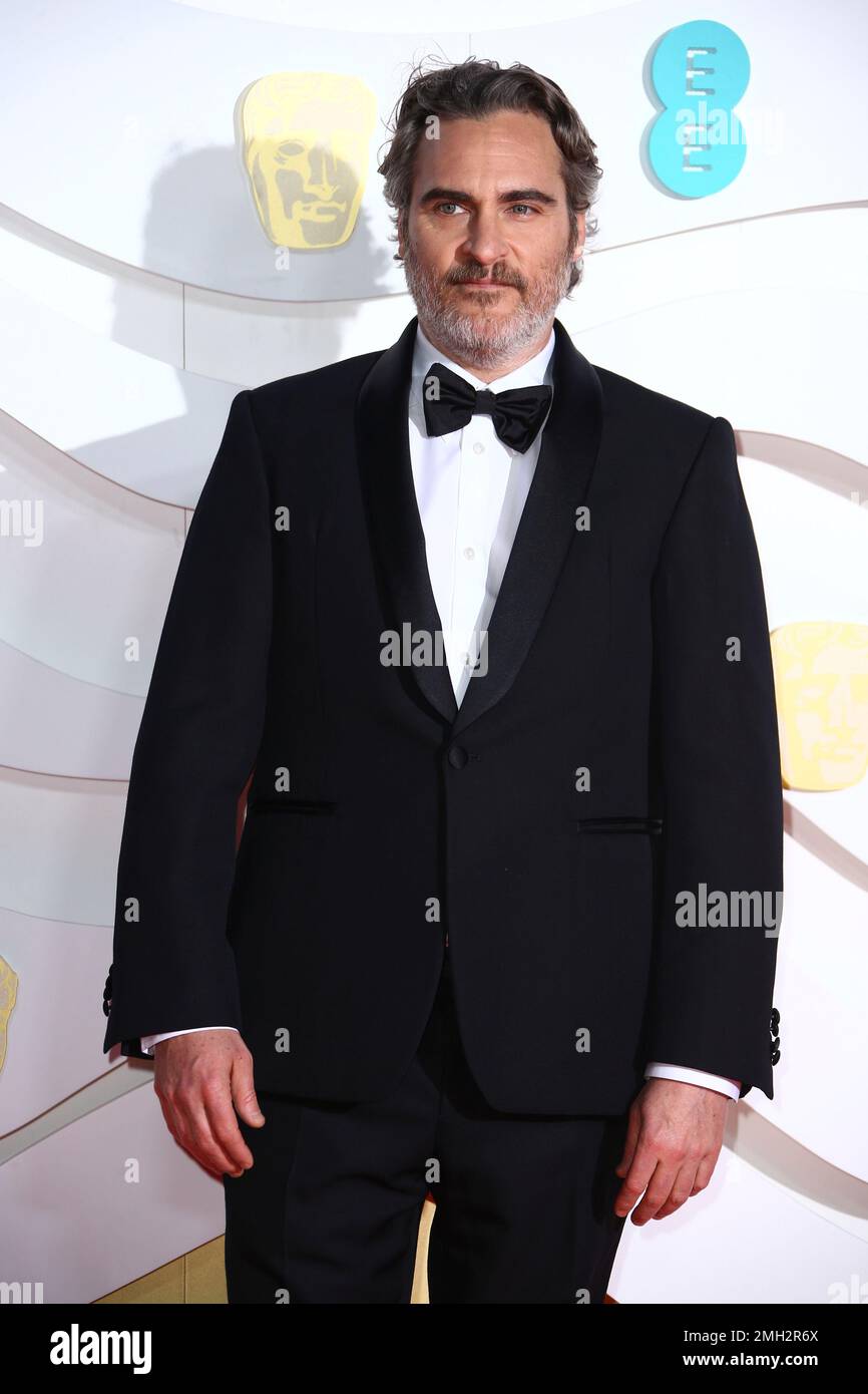 Actor Joaquin Phoenix poses for photographers upon arrival at the Bafta ...
