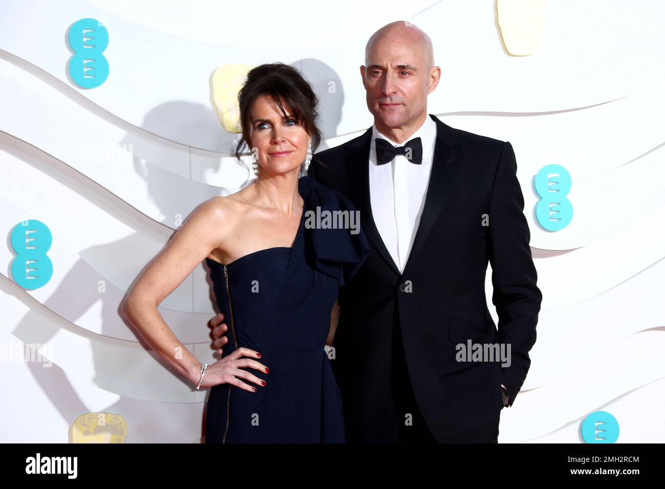 Actor Mark Strong, right, and wife Liza Marshall pose for photographers ...