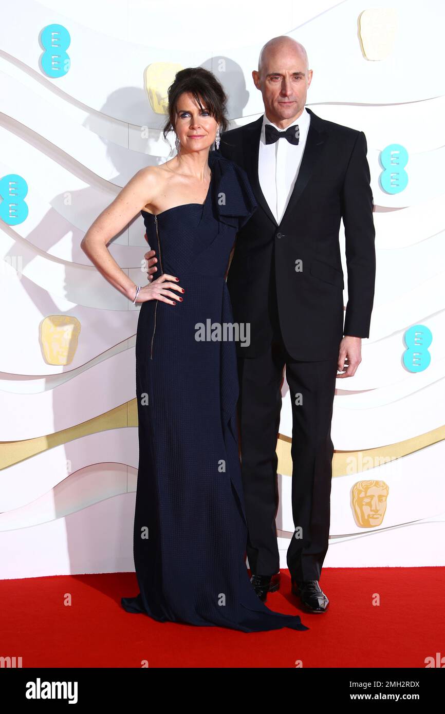 Actor Mark Strong, right, and wife Liza Marshall pose for photographers ...