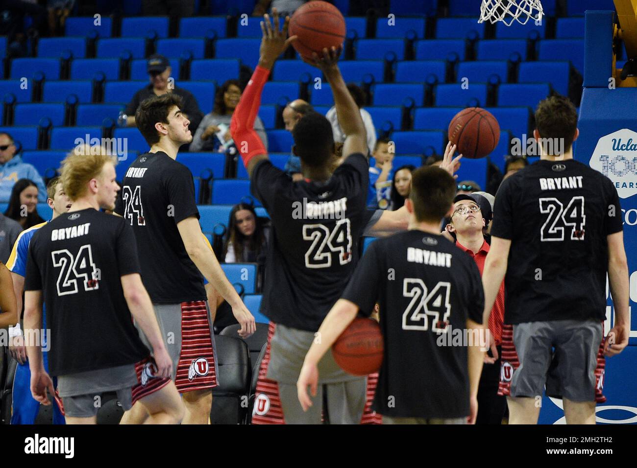 Utah players wear shirts with No. 24 on the back in honor of late Los ...