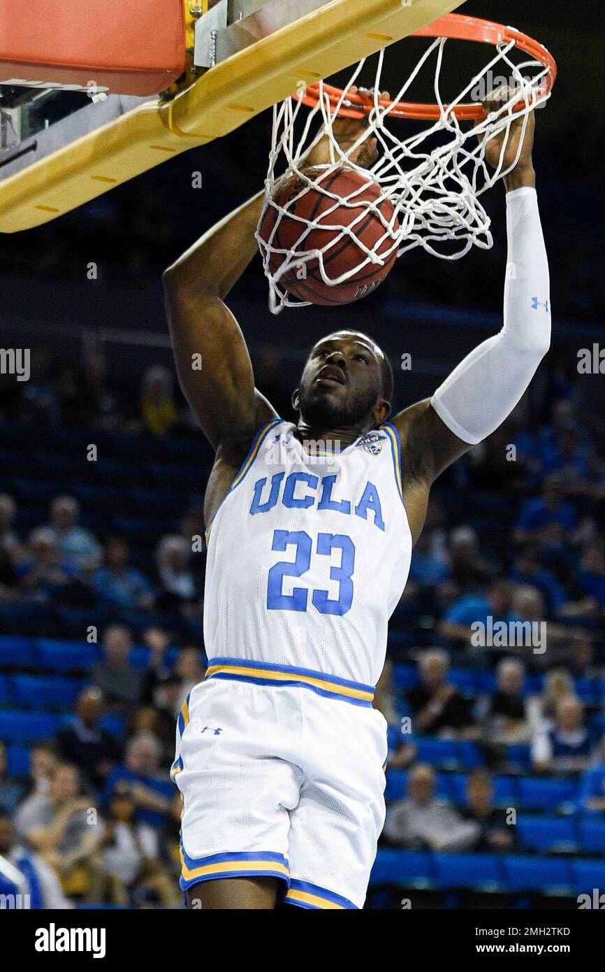 UCLA guard Prince Ali dunks during the first half of an NCAA college ...