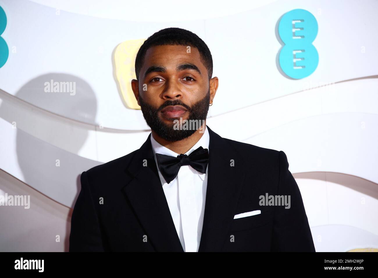 Anthony Welsh poses for photographers upon arrival at the Bafta Film ...