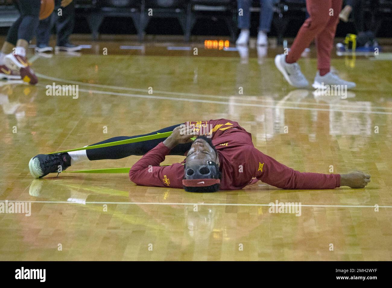 Iowa State's Tre Jackson stretches before an NCAA college basketball ...
