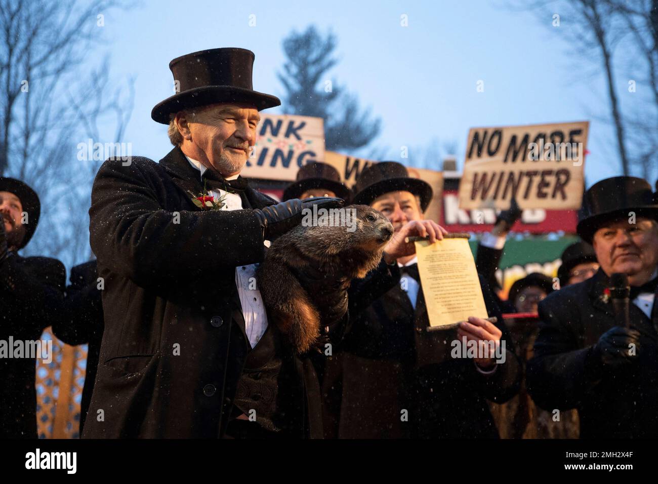 Groundhog Club co-handler John Griffiths holds Punxsutawney Phil during ...