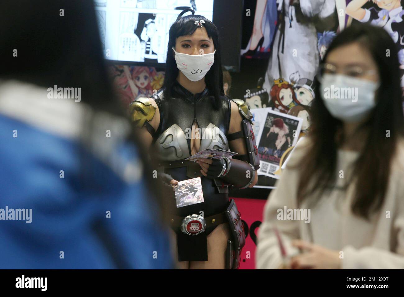 A showgirl wears face mask at the Comic Exhibition in Taipei, Taiwan ...