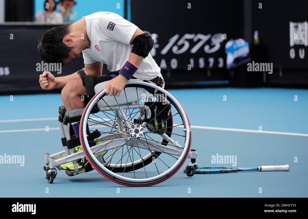 Japan's Shingo Kunieda celebrates after defeating Britain's Gordon Reid ...