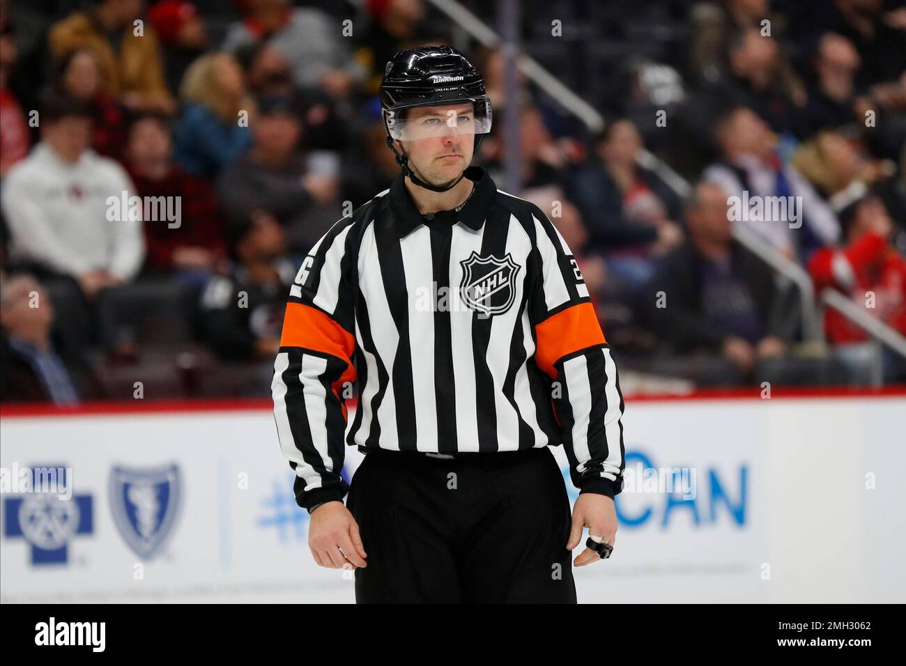 Referee Jon McIsaac watches in the third period of an NHL hockey game ...