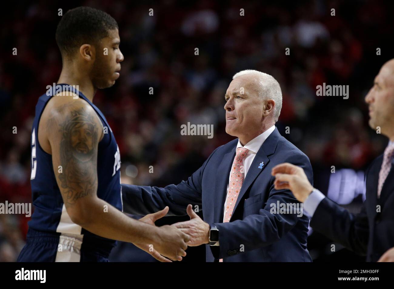 Penn State coach Patrick Chambers greets Myles Dread, left, during the ...