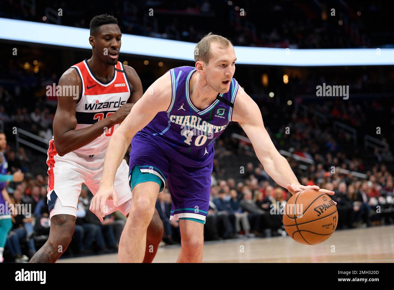 Charlotte Hornets center Cody Zeller (40) dribbles the ball against ...