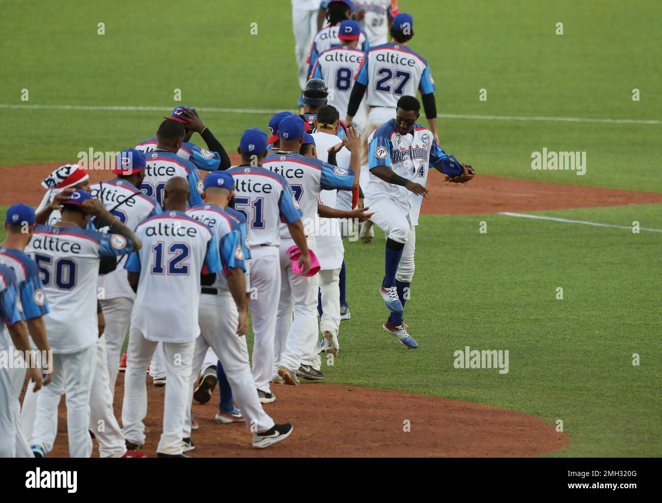 Dominican Republic's players celebrate after defeated Mexico 2-1 during ...