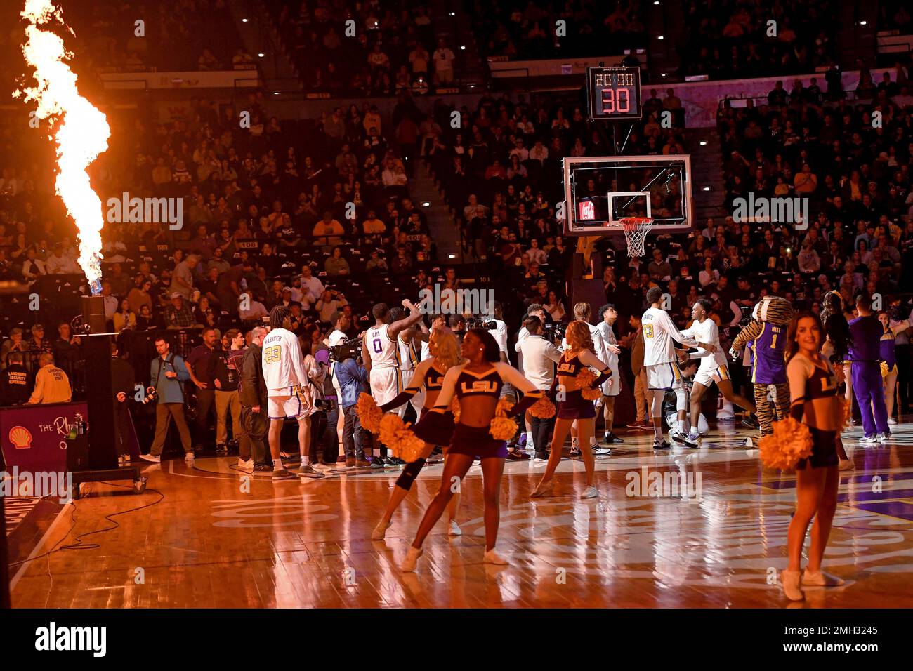 Flames fire as the LSU players are introduced before the first half of ...