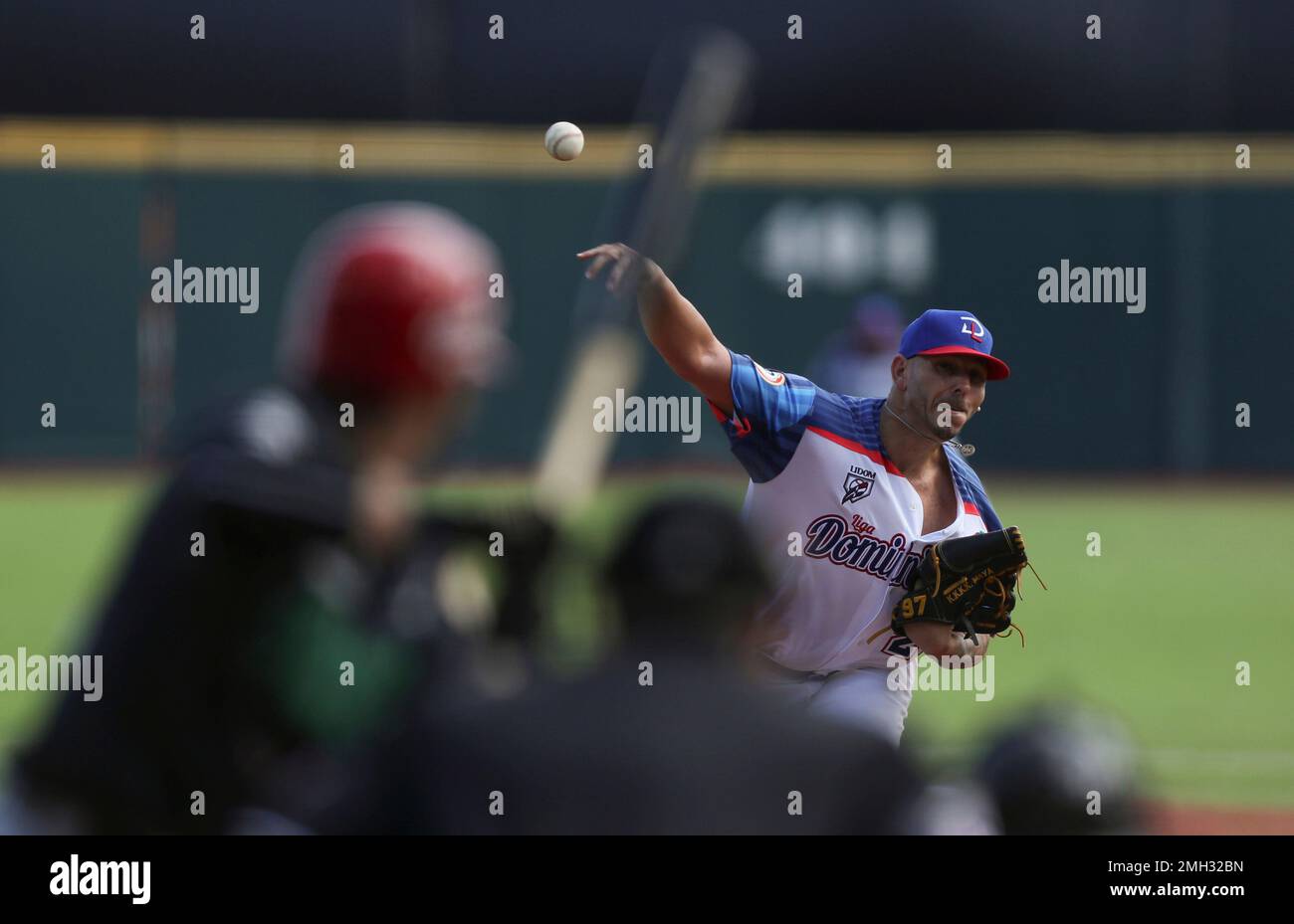 Dominican Republic's pitcher Yunesky Maya throws the ball to Mexico's ...