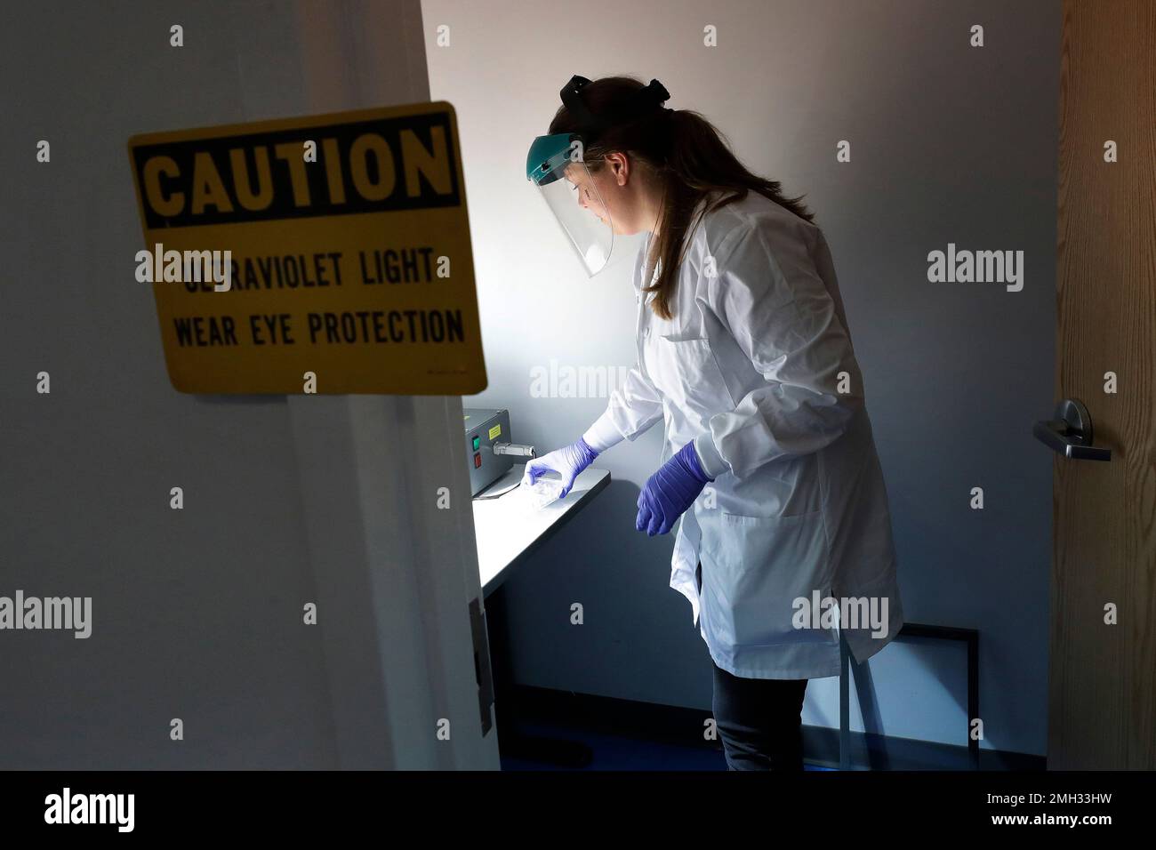 In this Wednesday, Jan. 15, 2020, photo, scientist and study director ...