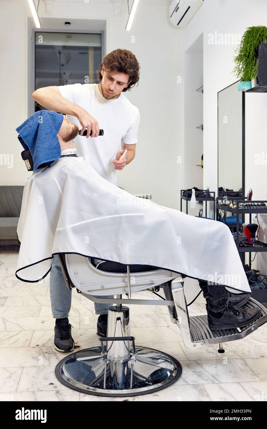 Barber shop unrecognizable male hands hi-res stock photography and ...