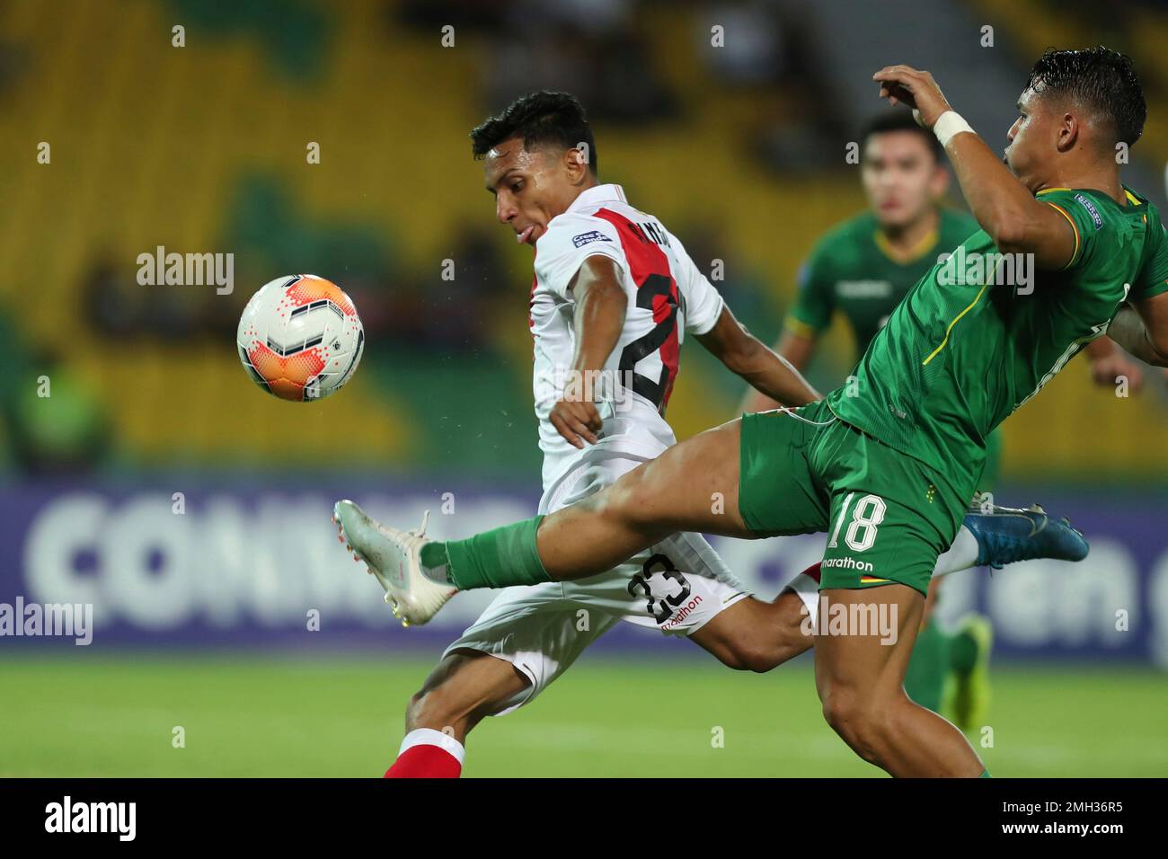 Bolivia's Luis Saldias, right, challenges Peru's Kevin Sandoval during ...