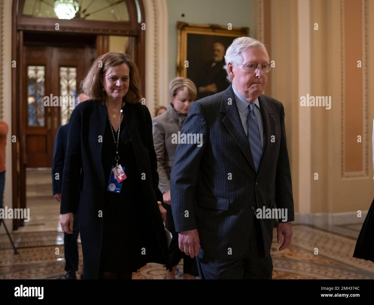 Senate Majority Leader Mitch McConnell, R-Ky., accompanied by his chief ...