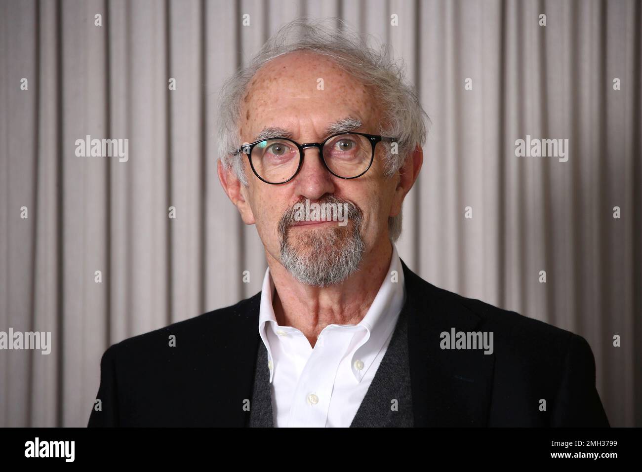 Jonathan Pryce poses for photographers upon arrival at the Academy ...