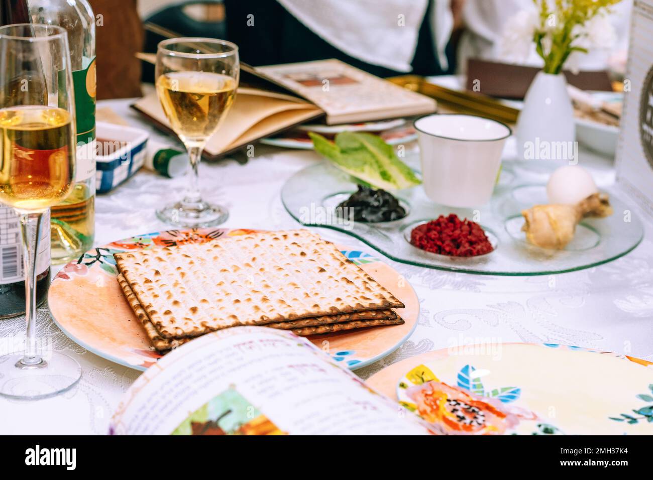 Passover table setting with a traditional Passover seder plate with ...