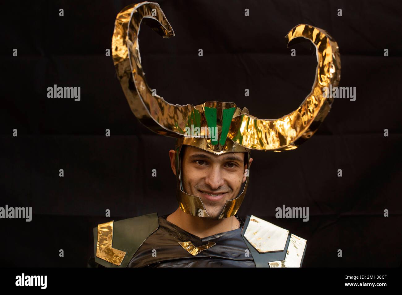 Mustafa Samir poses for a portrait dressed as the Marvel character Loki ...