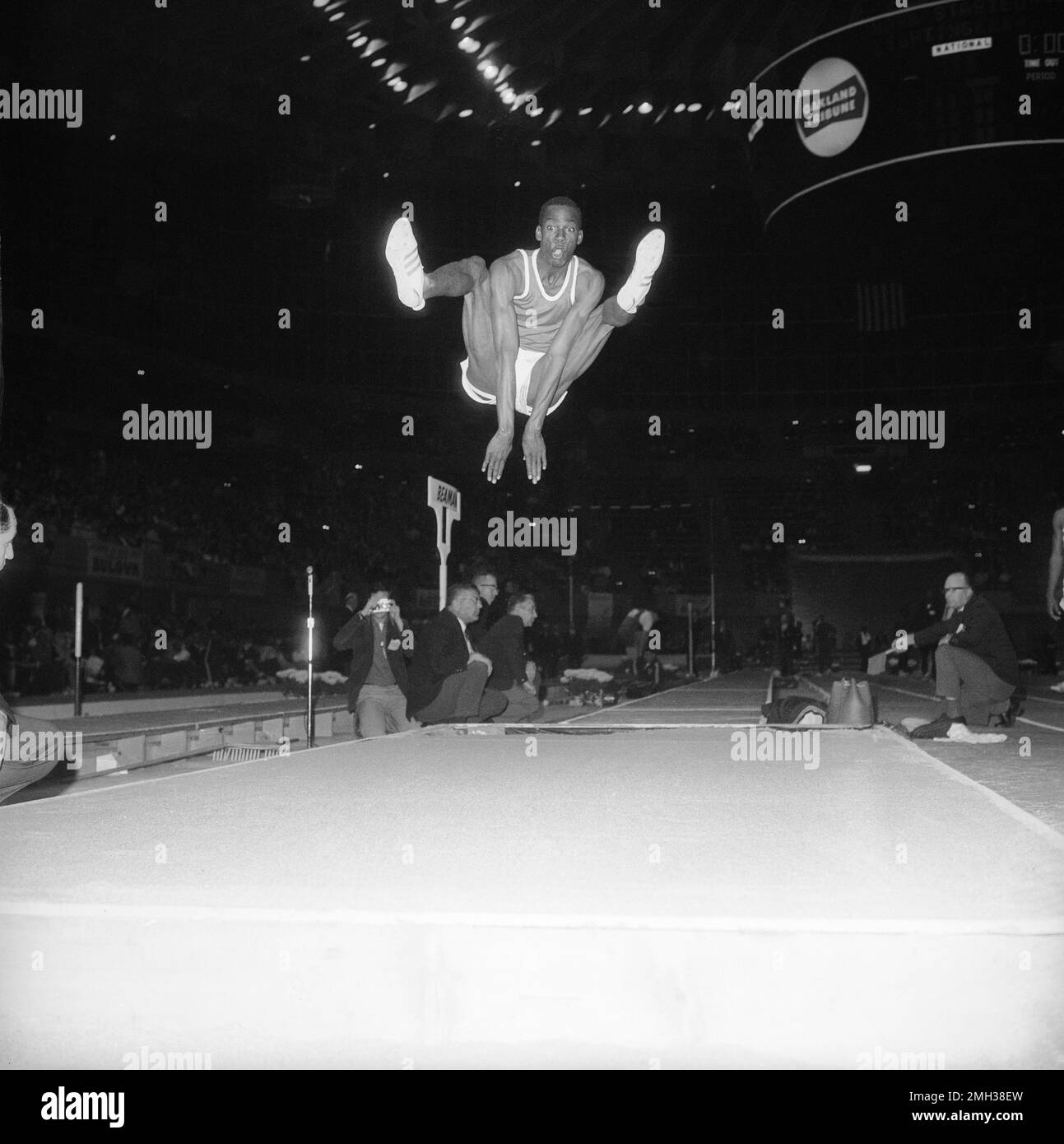 Caught in mid-flight of his unusual style, Bob Beamon of the University ...