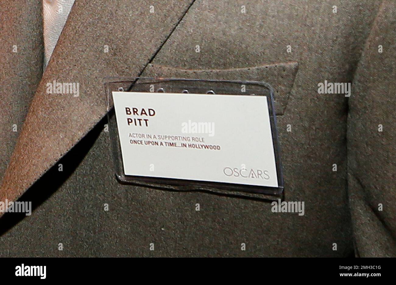 A name tag worn by Brad Pitt is seen at the 92nd Academy Awards ...