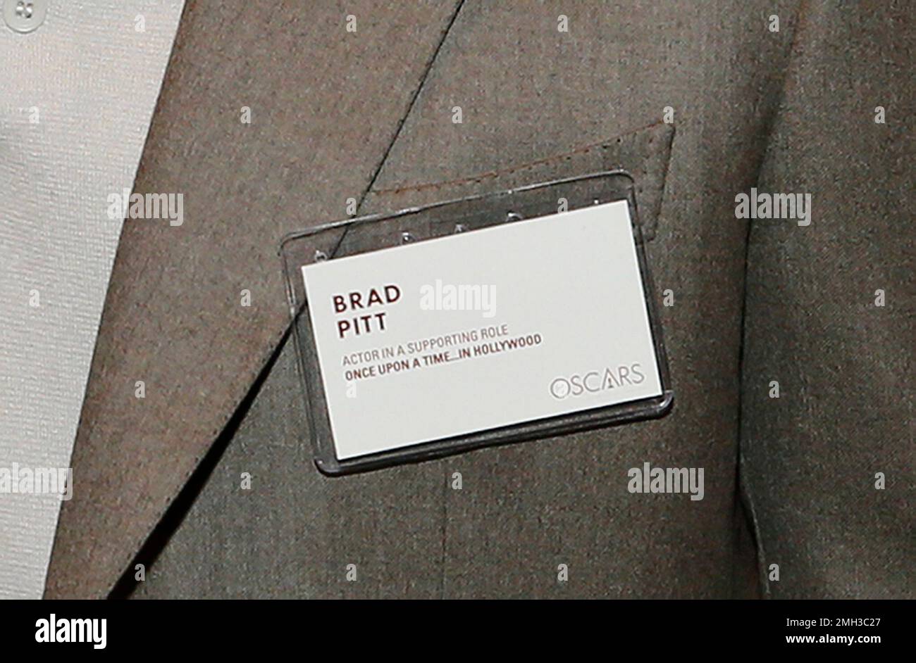 A name tag worn by Brad Pitt is seen at the 92nd Academy Awards ...