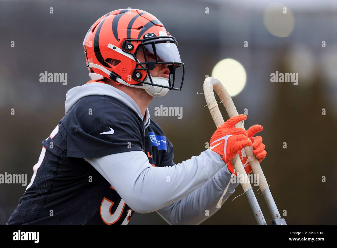 Cincinnati Bengals linebacker Logan Wilson runs a drill during an NFL ...