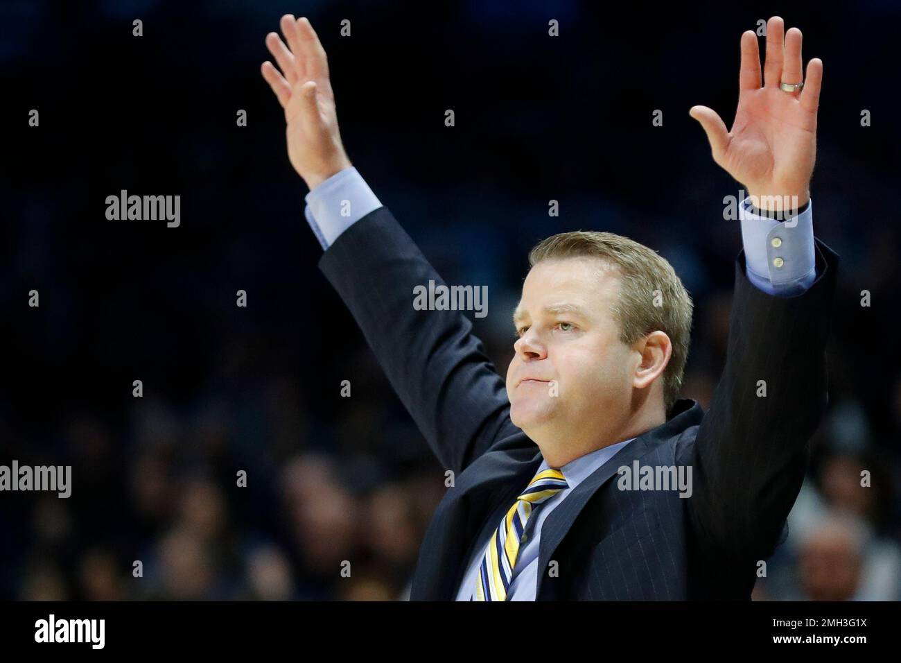 Marquette head coach Steve Wojciechowski directs his players from the ...