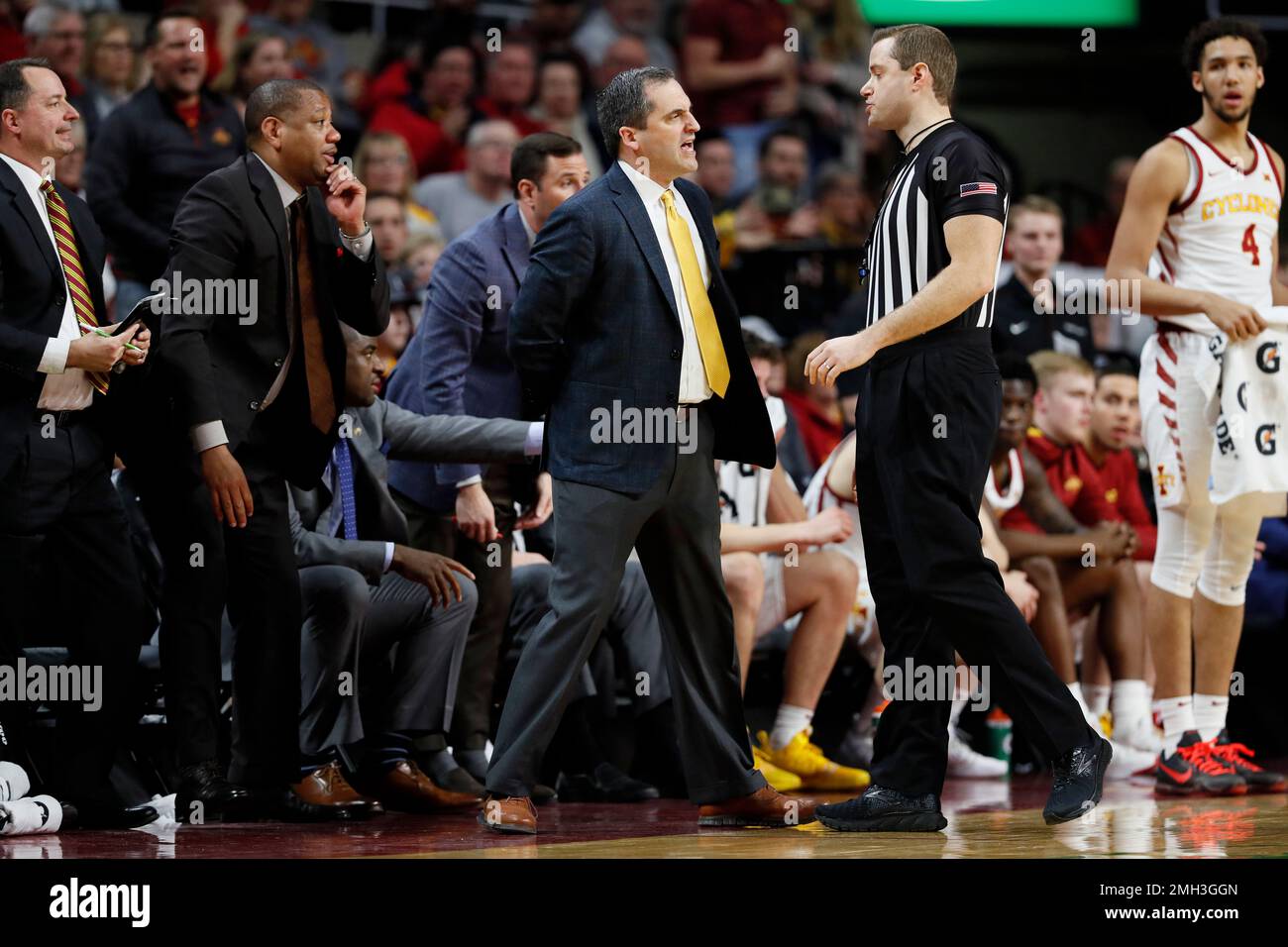 Iowa State coach Steve Prohm, center, questions a call against his team ...