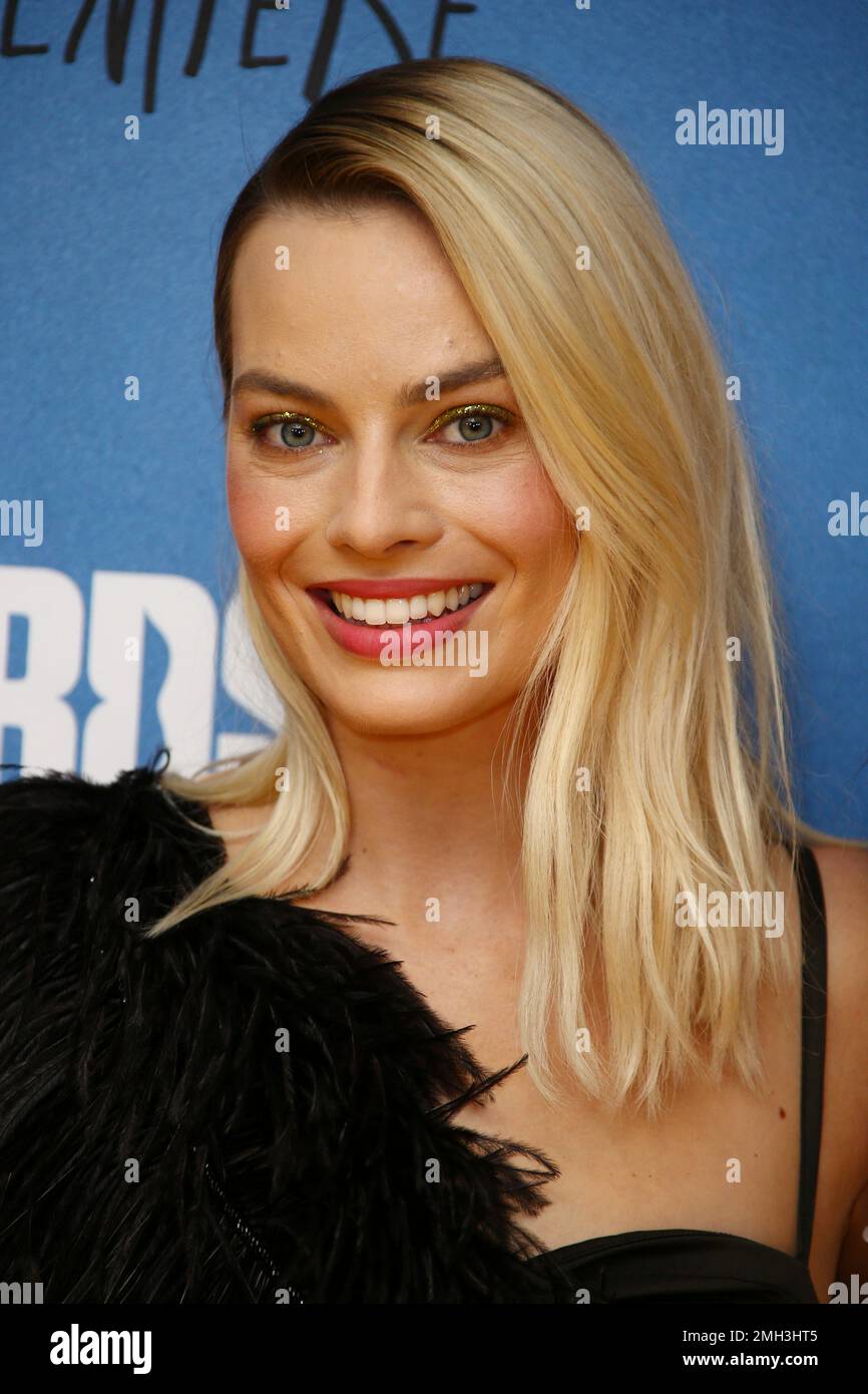Actress Margot Robbie poses for photographers upon arrival at the world ...