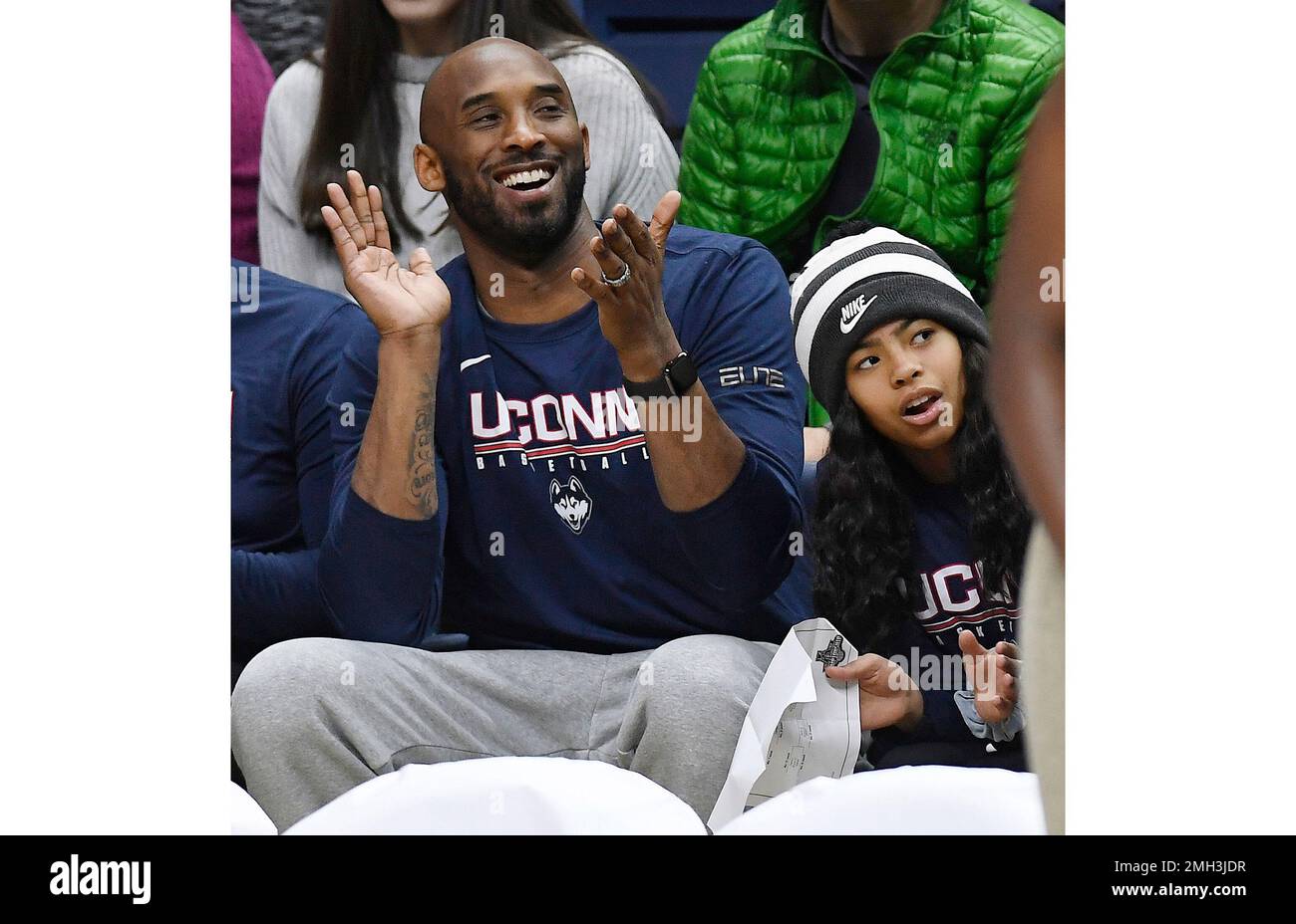 In this March 2, 2019 photo, Kobe Bryant and his daughter Gianna watch ...
