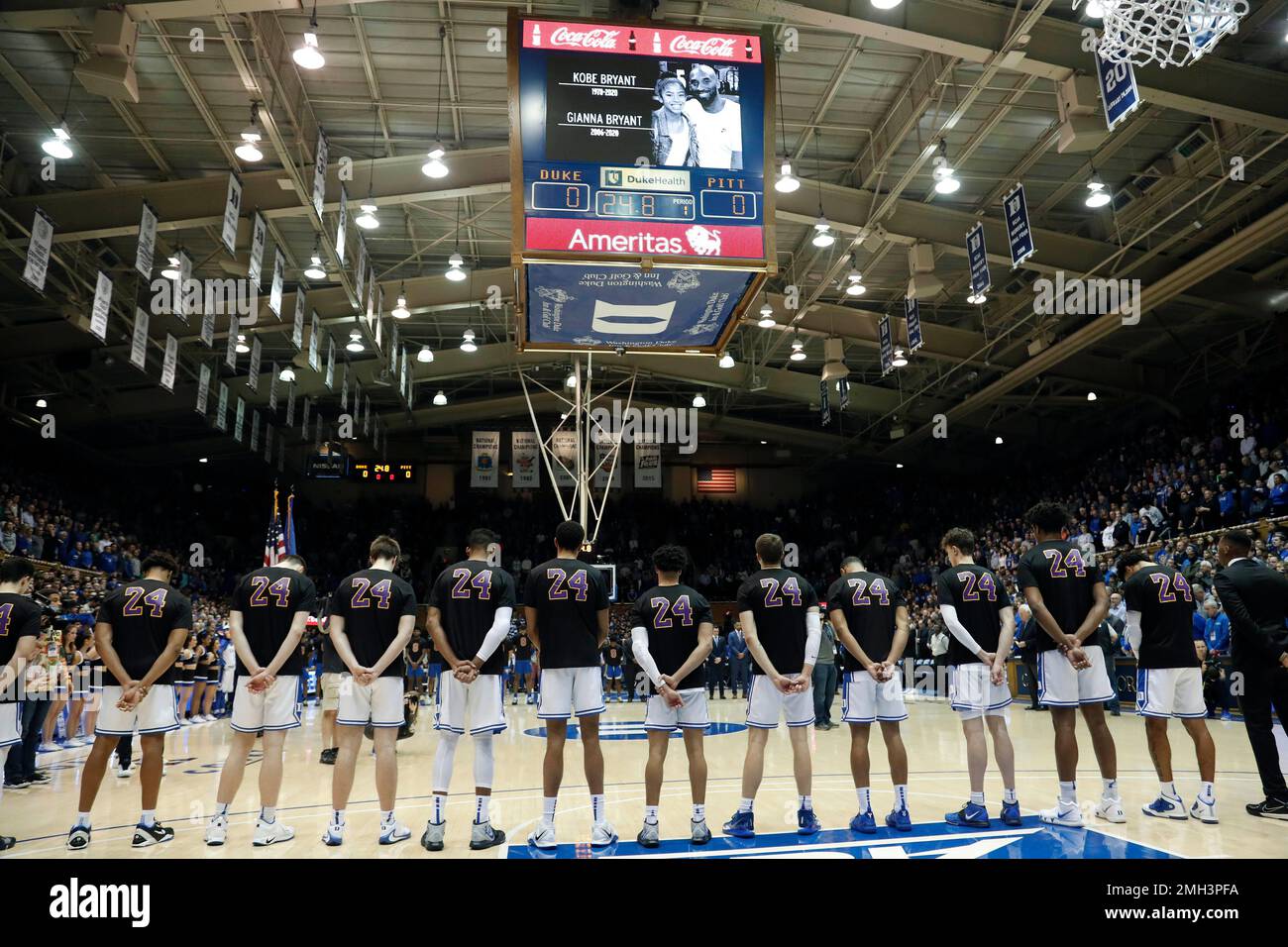 Duke players wear a Number 24 jersey during a moment of silence in ...