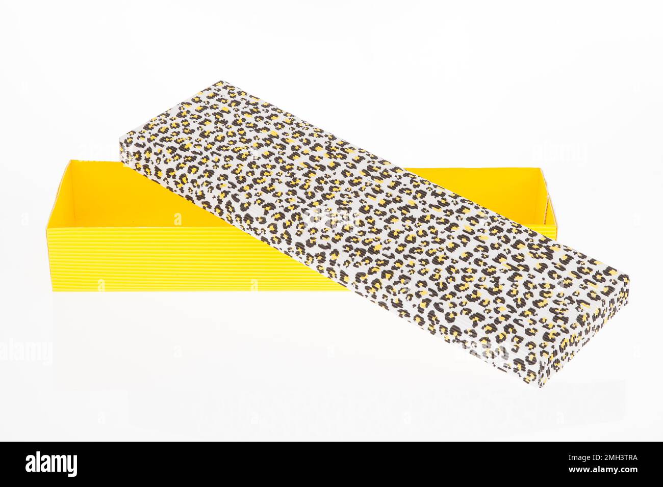 yellow corrugated cardboard box with lid for packing gifts and presents ...