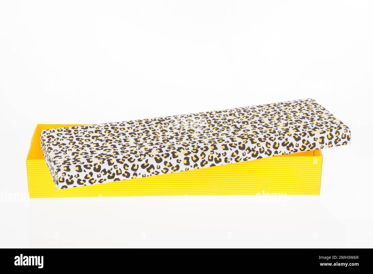 yellow corrugated cardboard box with lid for packing gifts and presents ...