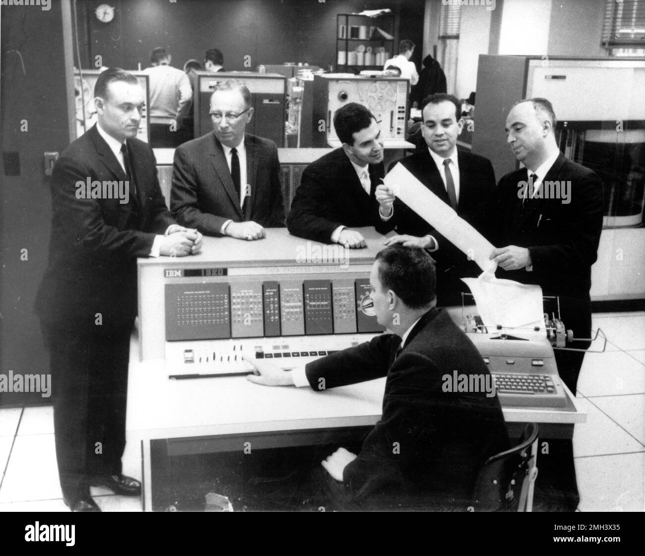 Clustered around AP's first IBM 1620 computer system at New York ...