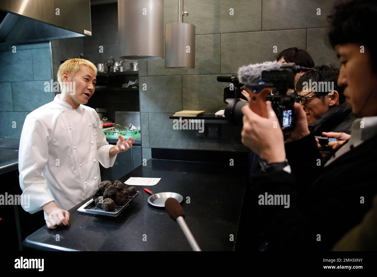 Japan's Kei Kobayashi, Chef of the restaurant Kei, answers reporters in ...