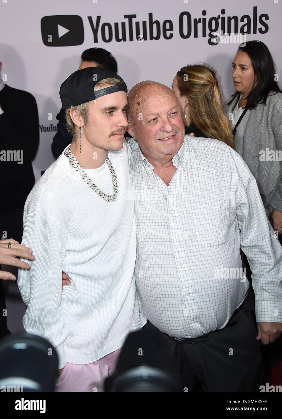 Justin Bieber and Bruce Dale arrive at the Los Angeles premiere of ...