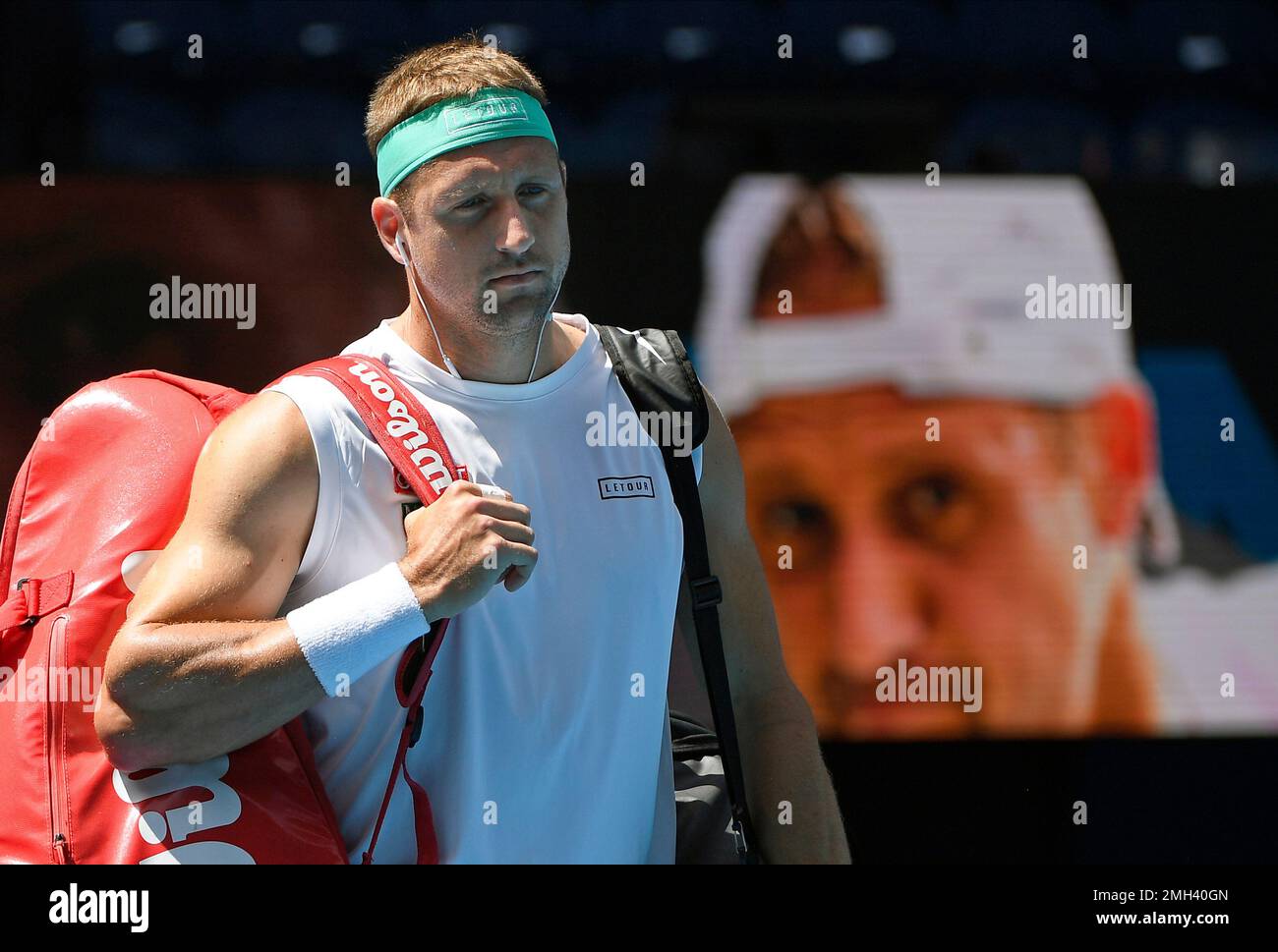 Tennys Sandgren of the U.S. walks onto Rod Laver Arena for his ...