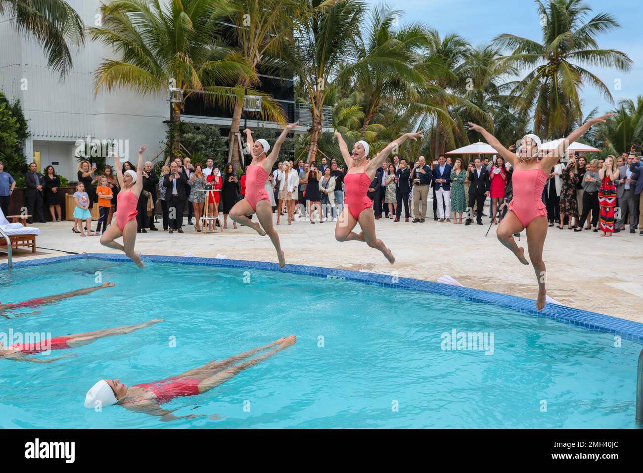IMAGE DISTRIBUTE FOR RITZ CARLTON - Synchronized swimmers at ribbon ...