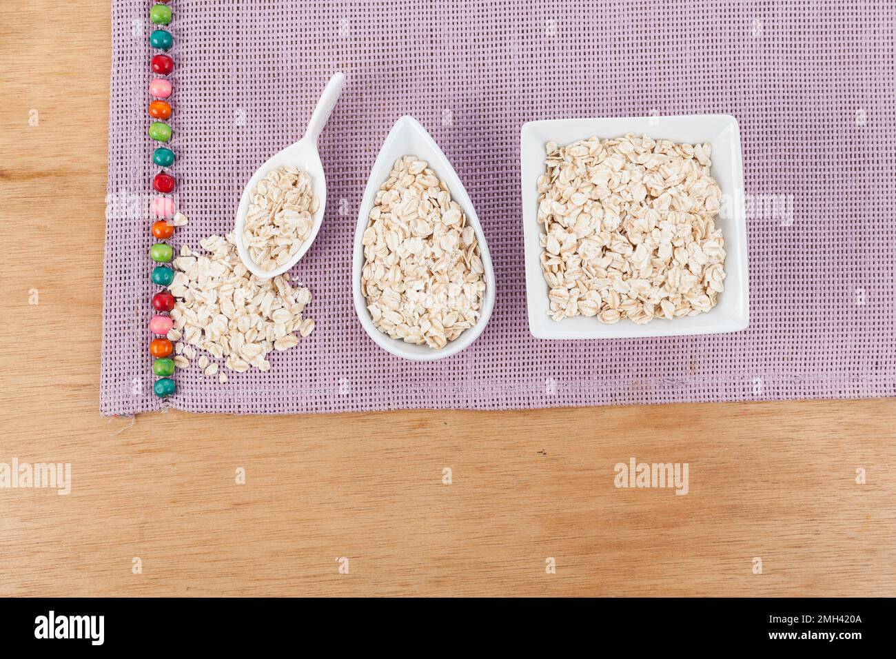 Flaked oatmeal a very healthy cereal Stock Photo - Alamy