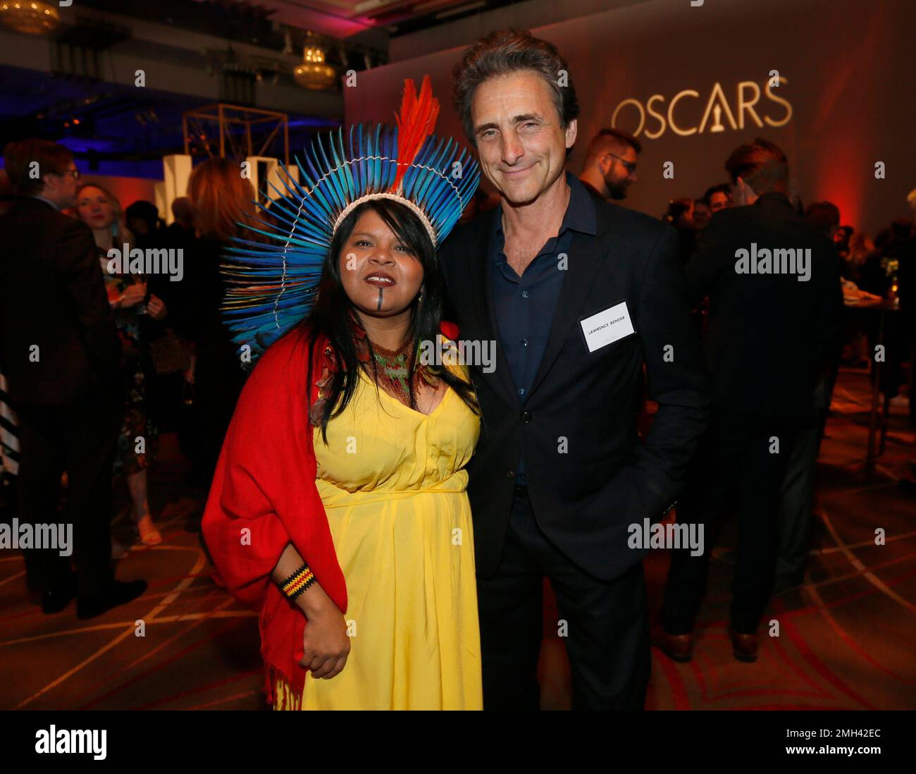 Sonia Guajajara, left, and Lawrence Bender attend the 92nd Academy ...